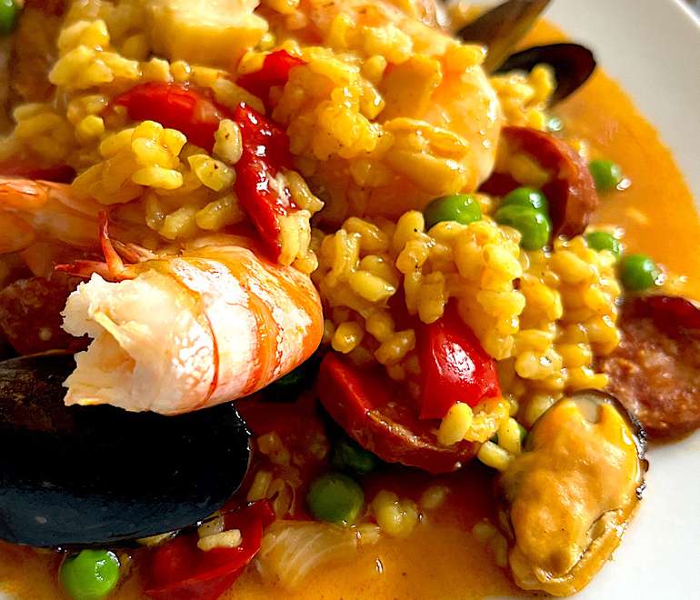 Spanish Paella: A Festive Fusion of Land and Sea Flavors - Recipes ...
